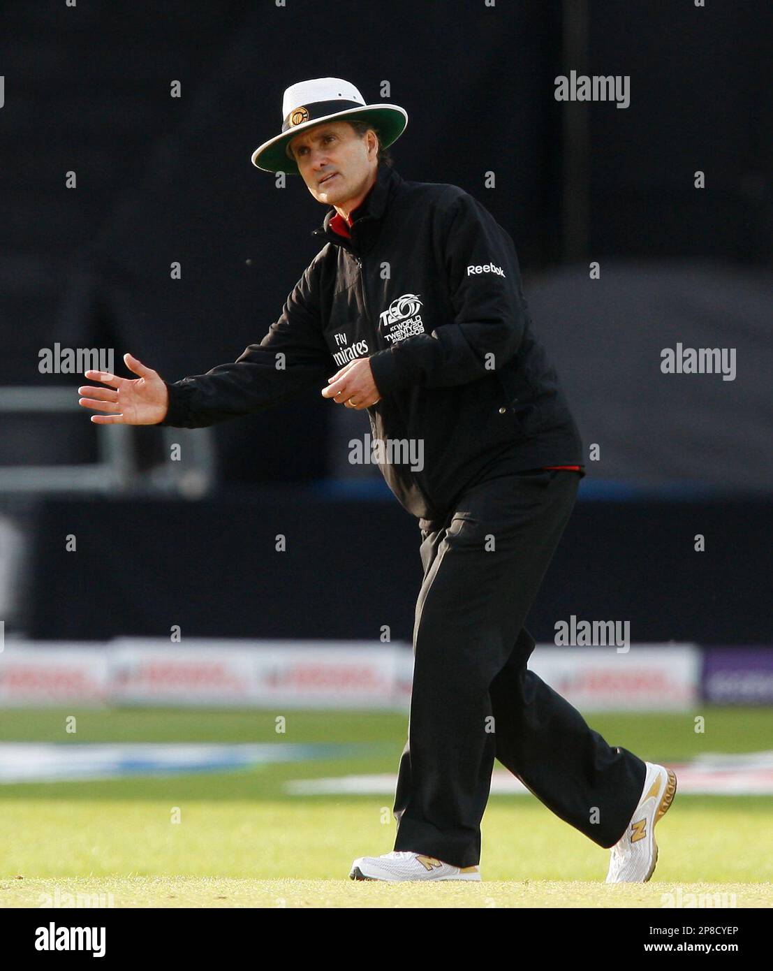 Umpire Billy Bowden signals as four as Australia are beaten by Sri ...