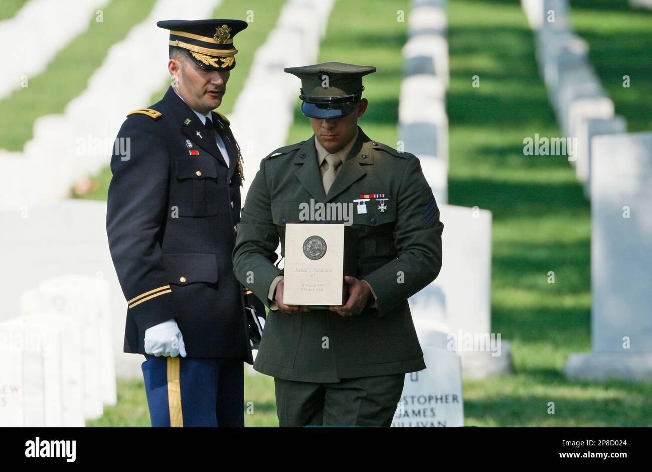 Navy corpsman Josue Castillo carries the remains of his sister, Army ...