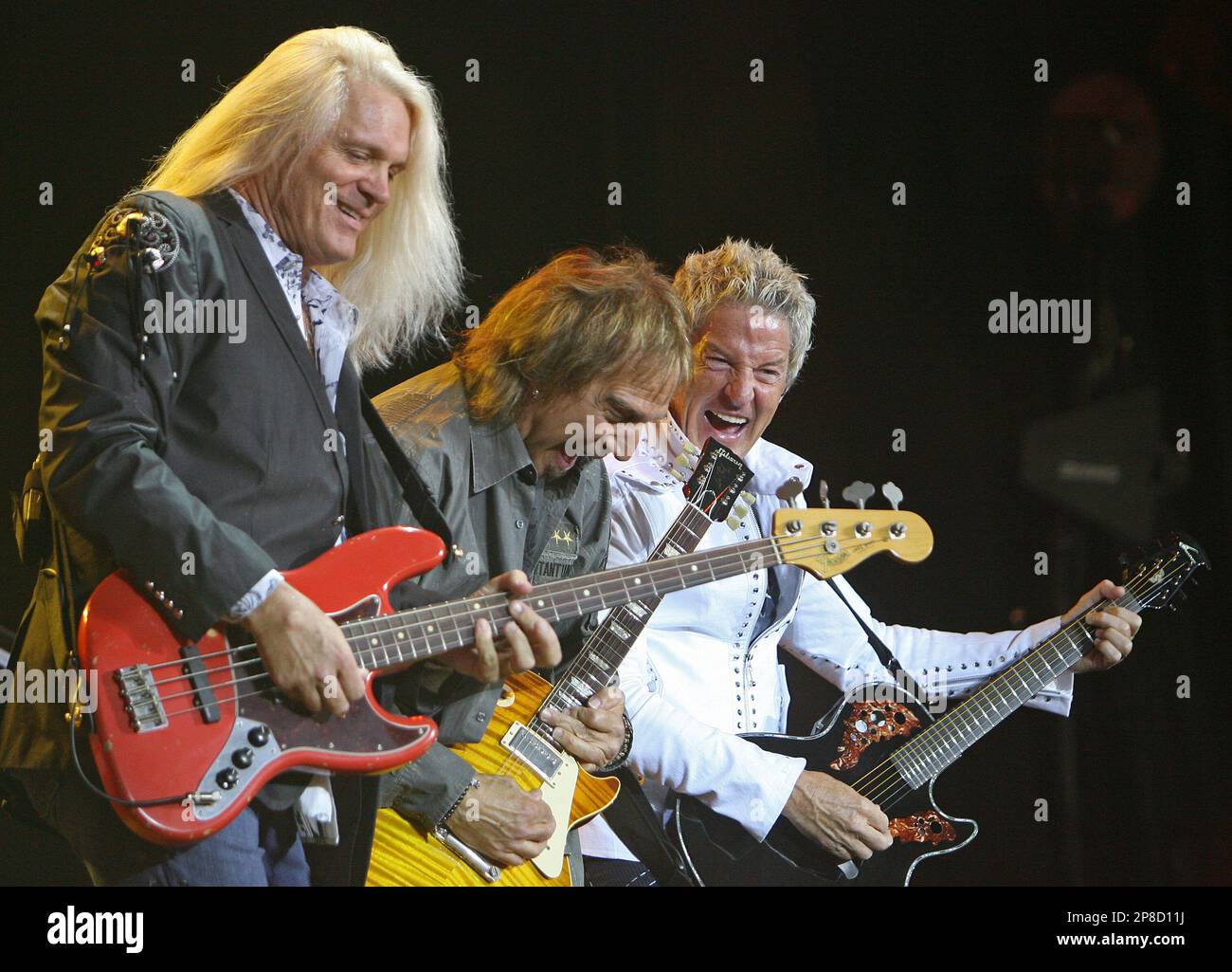 REO Speedwagon band members, left to right, Bruce Hall, Dave Amato and ...