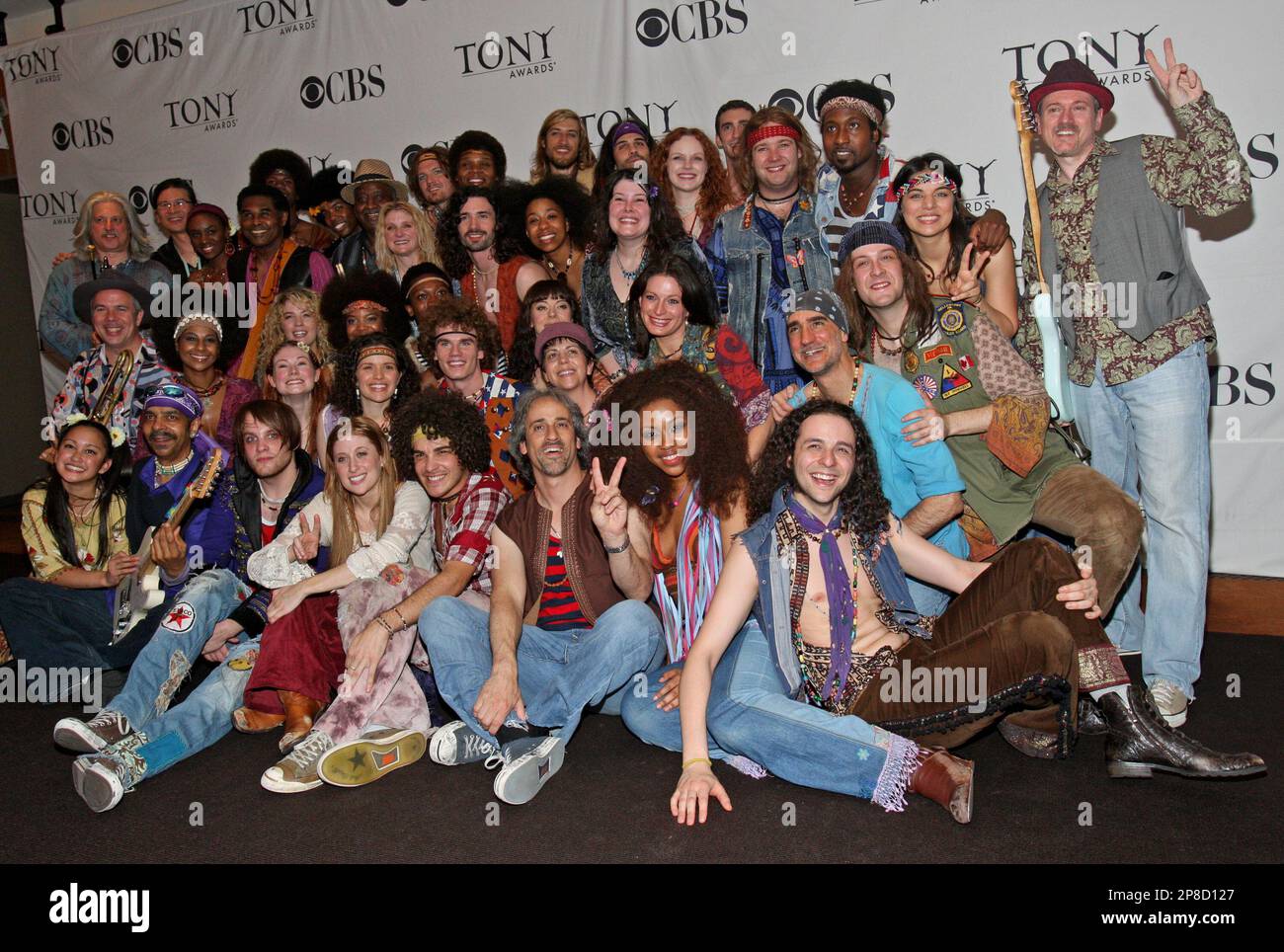 The cast of "Hair" poses for a photo after winning Best Revival of a ...