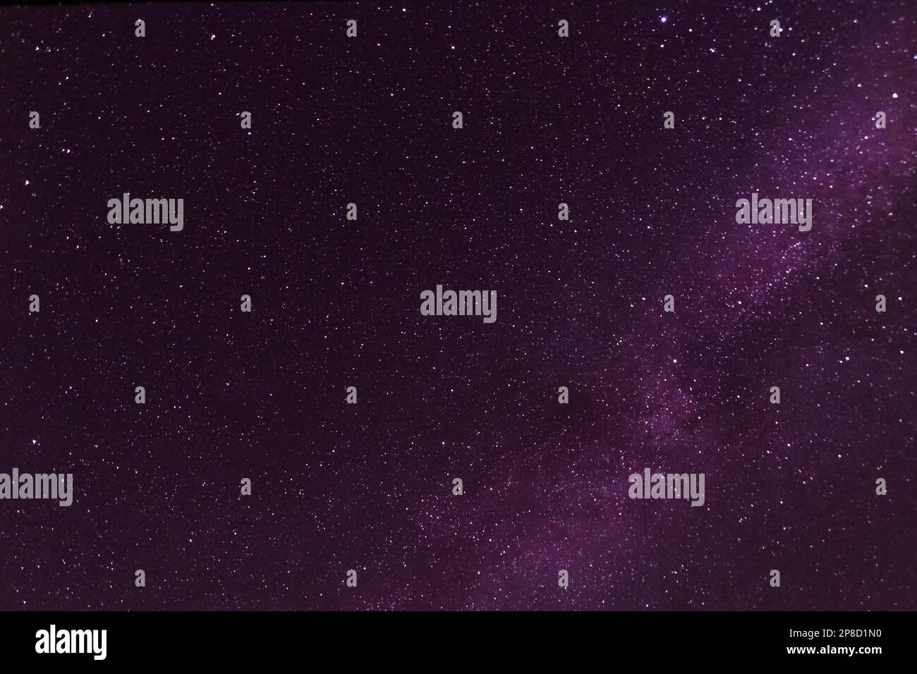 view on Milky Way galaxy in dark purple night sky Stock Photo - Alamy