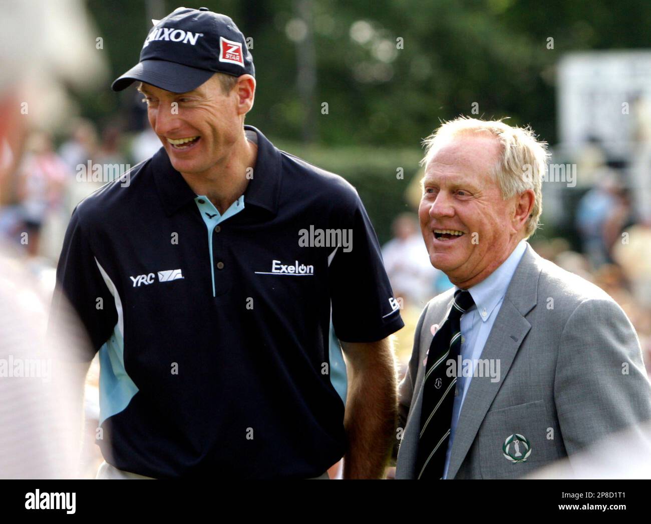Jim Furyk, left, laughs with Jack Nicklaus on the 18th green after ...