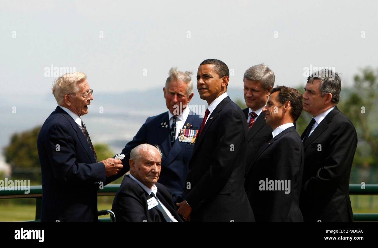U.S. President Barack Obama talks with D-Day veterans Clyde Combs of ...
