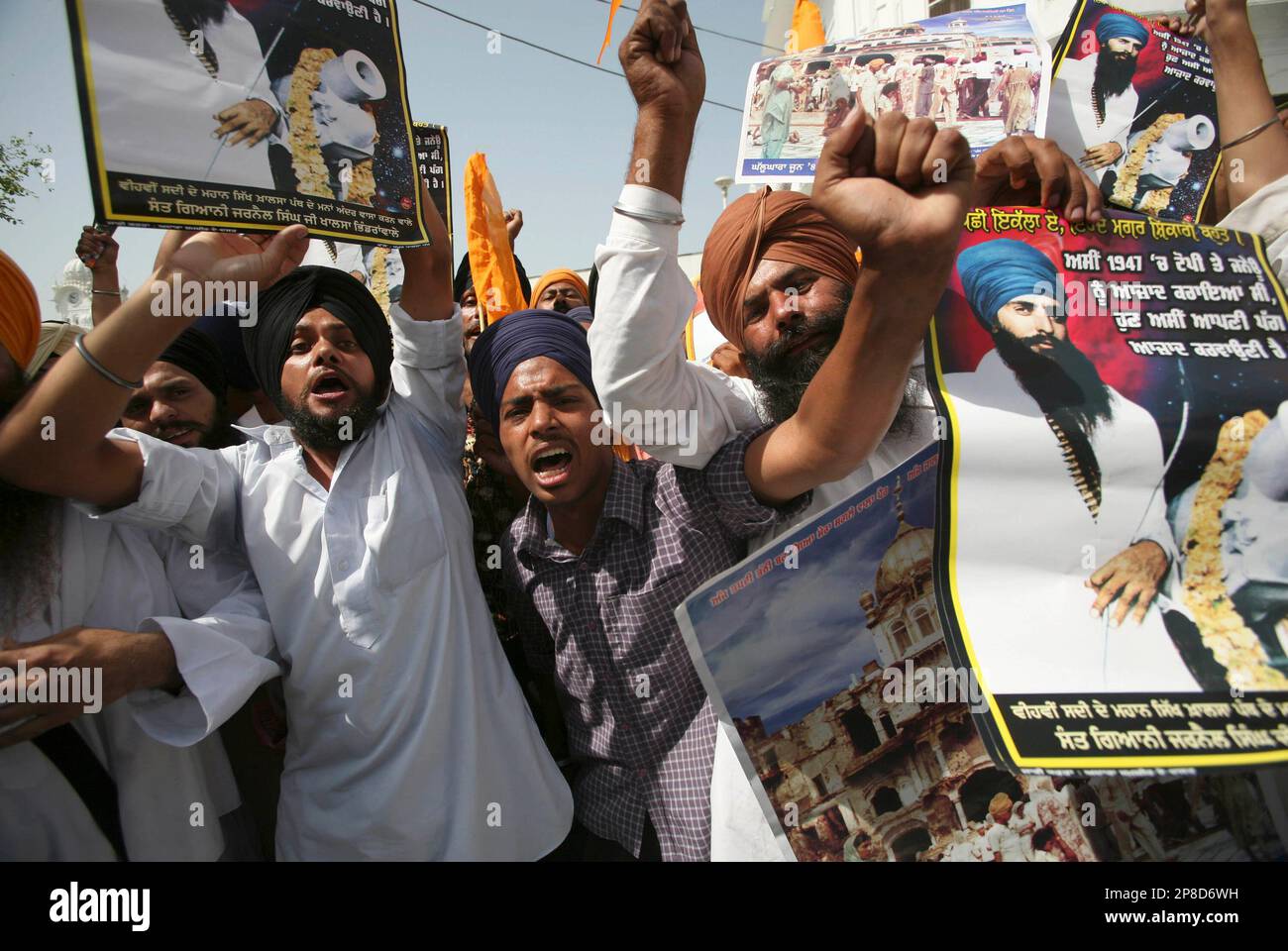 Sikhs shout pro-Khalistan and anti-India slogans as they hold placards ...