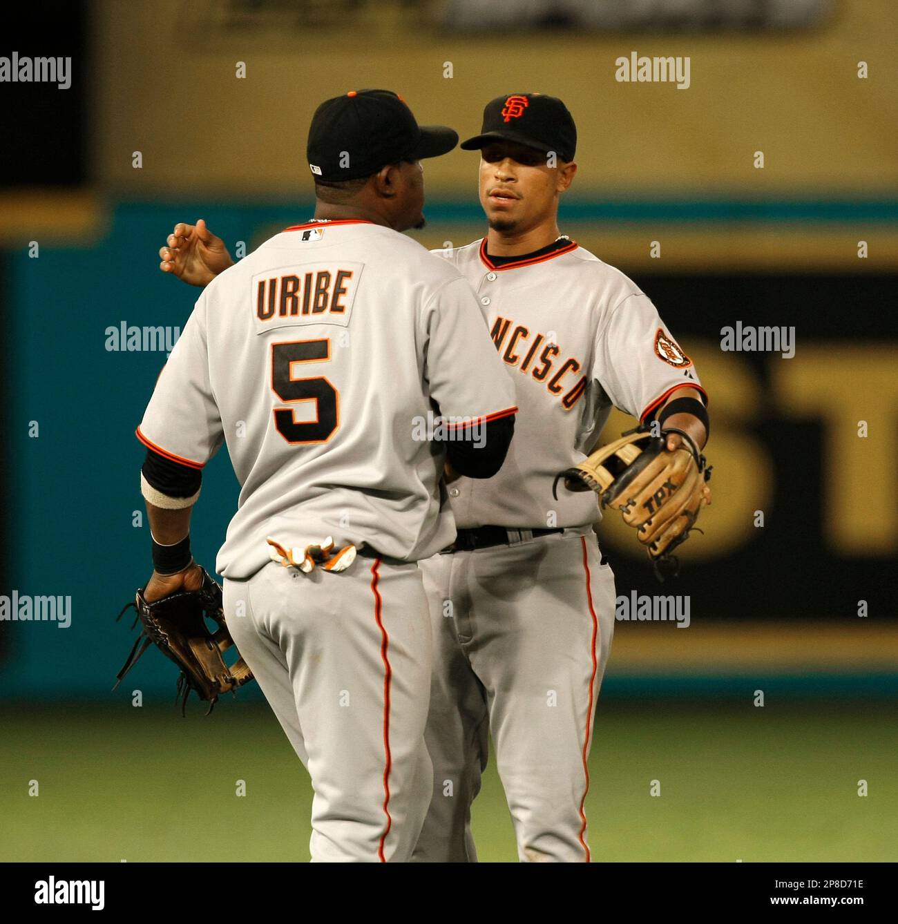 San Francisco Giants players Juan Uribe and Emanuel Burriss celebrate ...