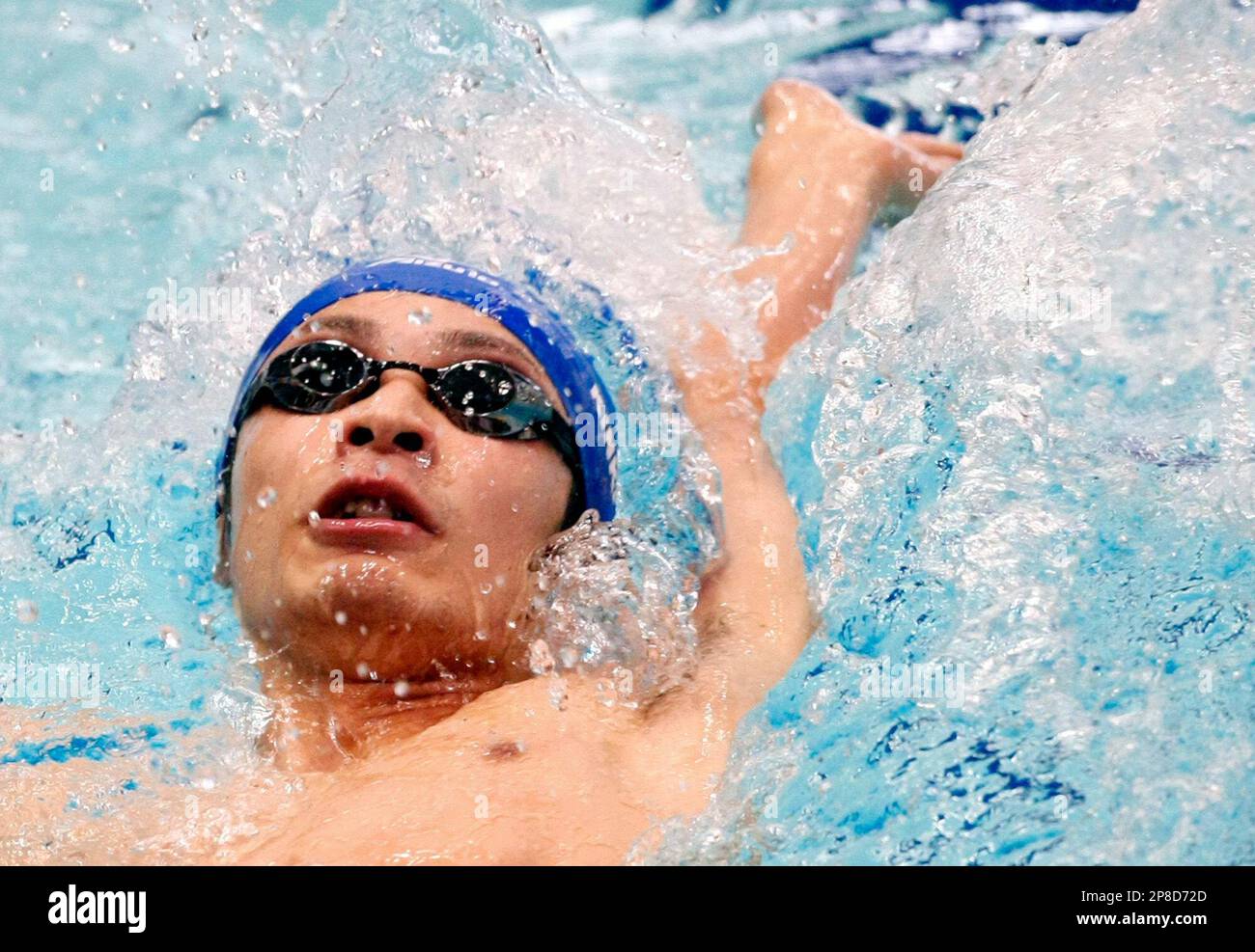 Ryosuke Irie of Japan races during the men's 200-meter backstroke heat ...