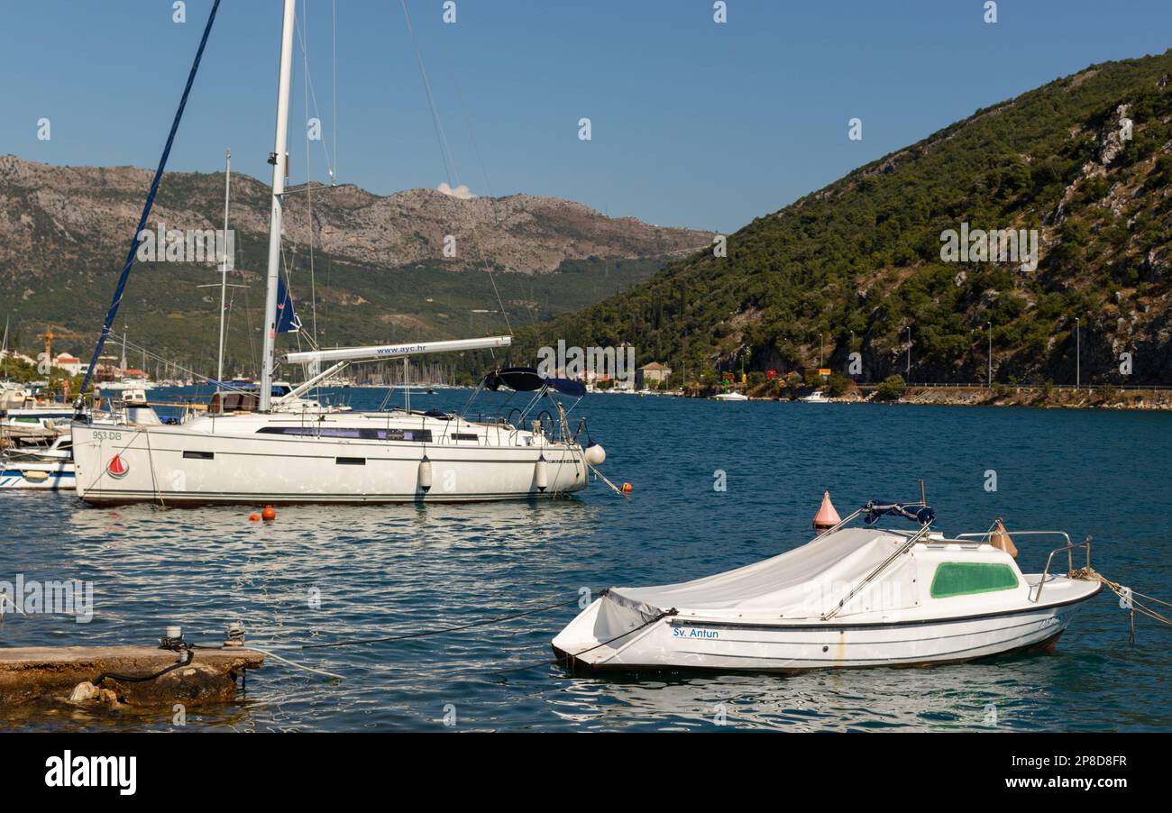 The coast of dubrovnik in croatia with a sailing boat hi-res stock ...