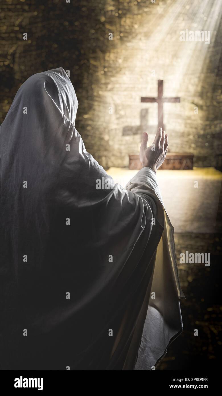Person praying in front of crucifix hi-res stock photography and images ...