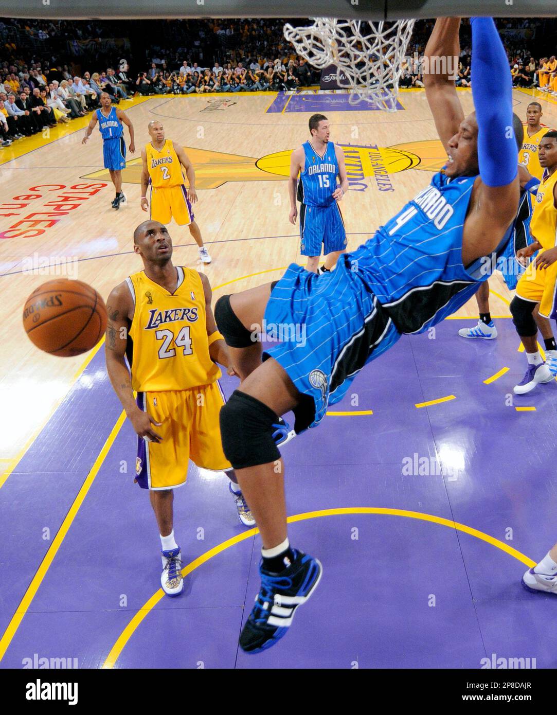 Orlando Magic forward Tony Battie (4) dunks as Los Angeles Lakers guard ...