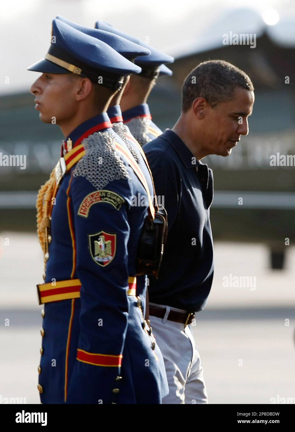 President Barack Obama walks past members of the Egyptian Republican ...