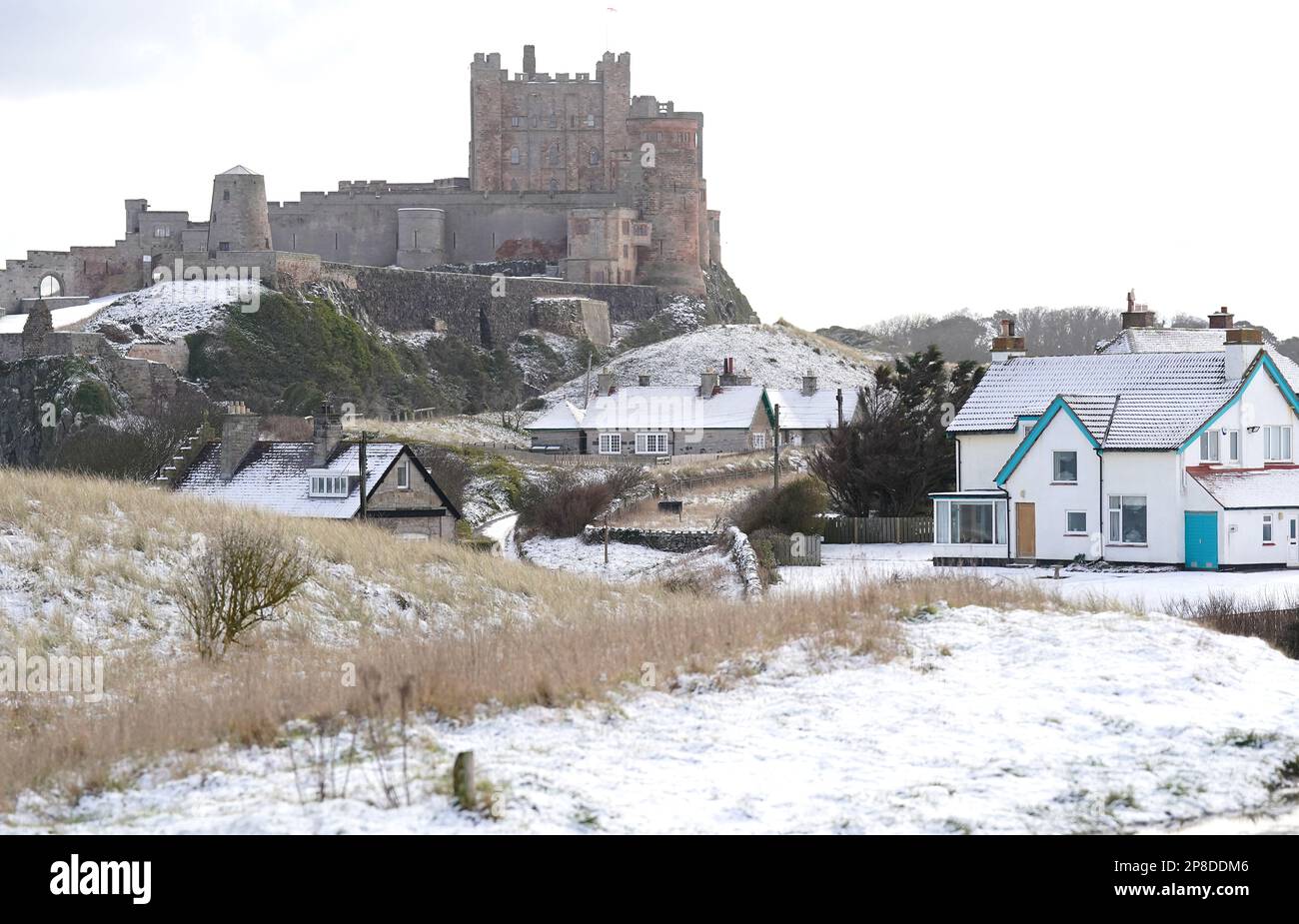 General view of Bamburgh Castle surrounded by snow in Bamburgh ...
