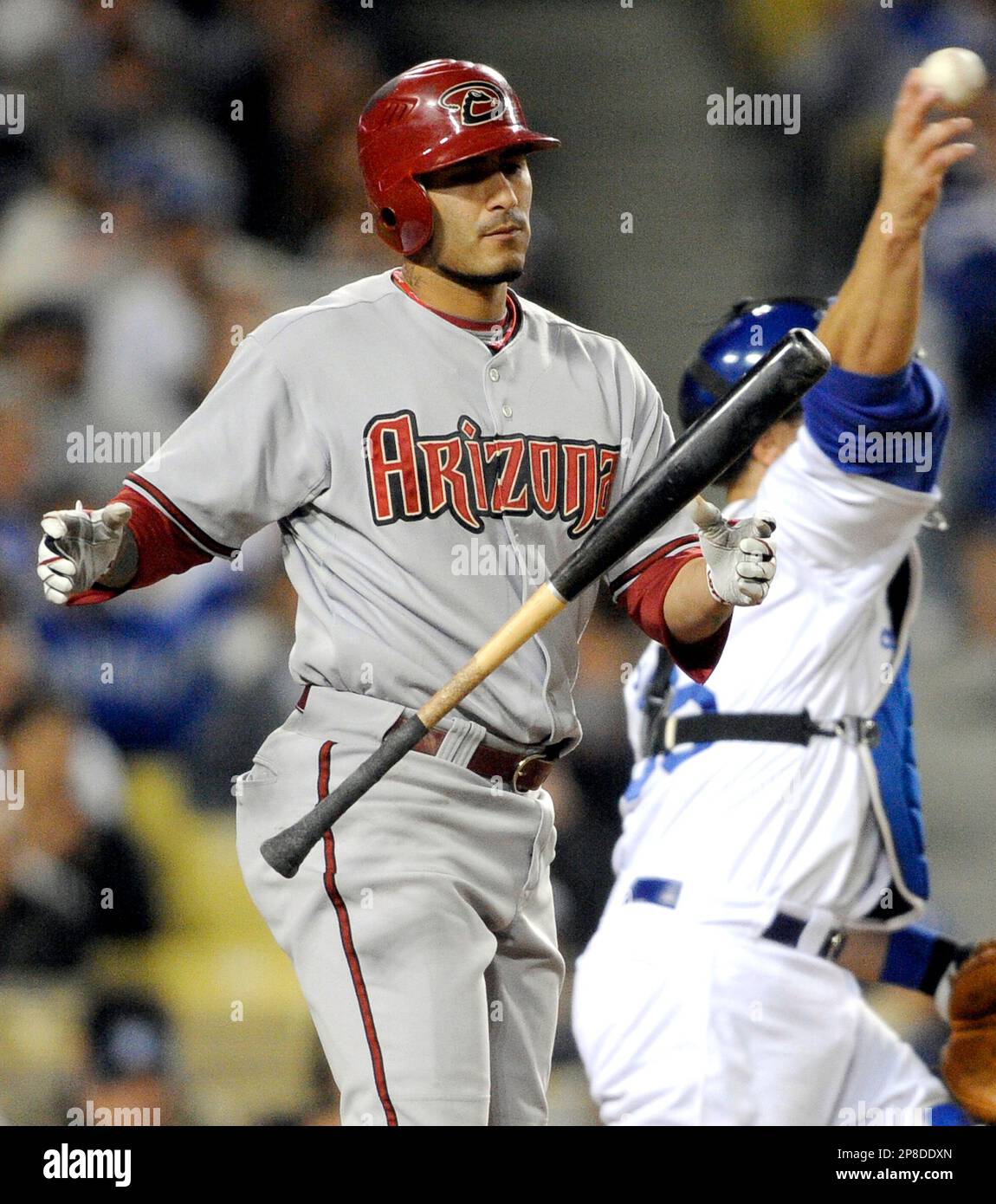 Arizona Diamondbacks' Felipe Lopez, left, reacts after striking out ...