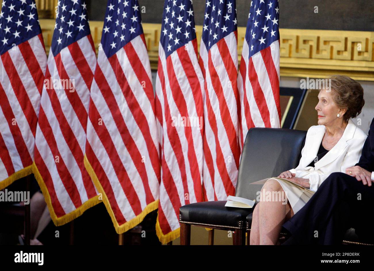 Former first lady Nancy Reagan sits in the Capitol Rotunda in ...