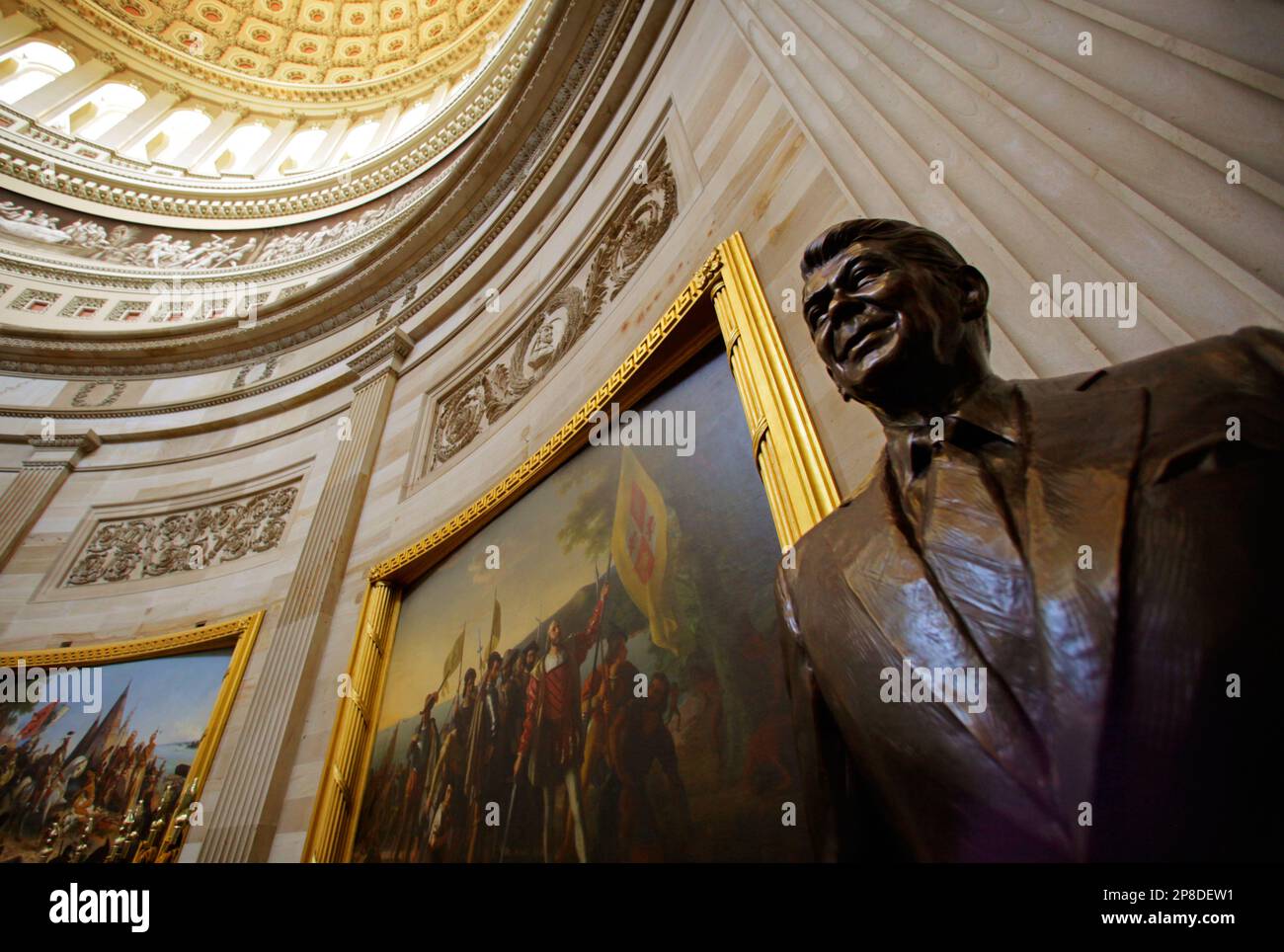 A statue of Ronald Reagan stands in the Rotunda of the Capitol in ...
