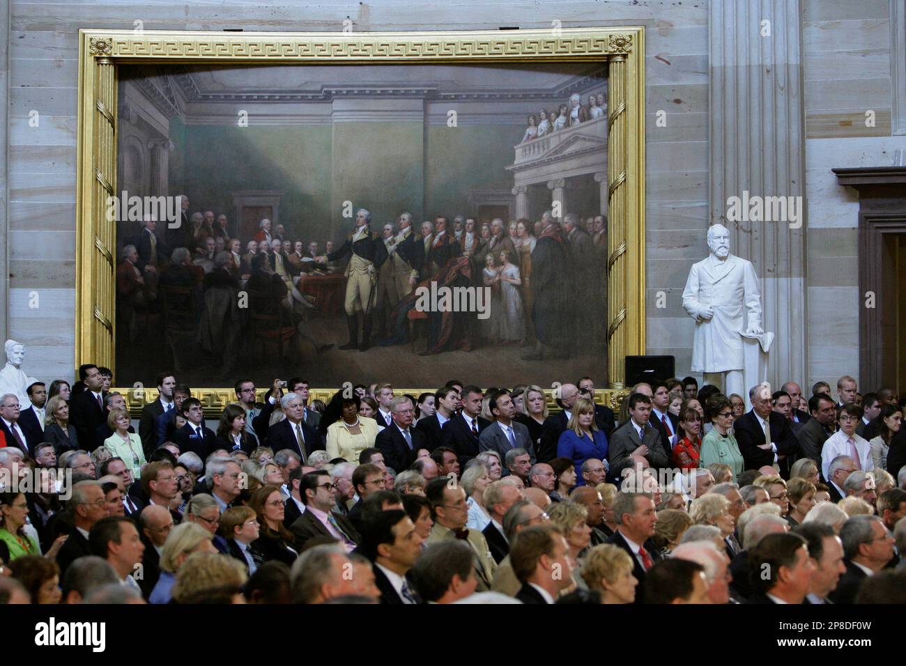 The crowd is standing room only during a ceremony in the Capitol ...