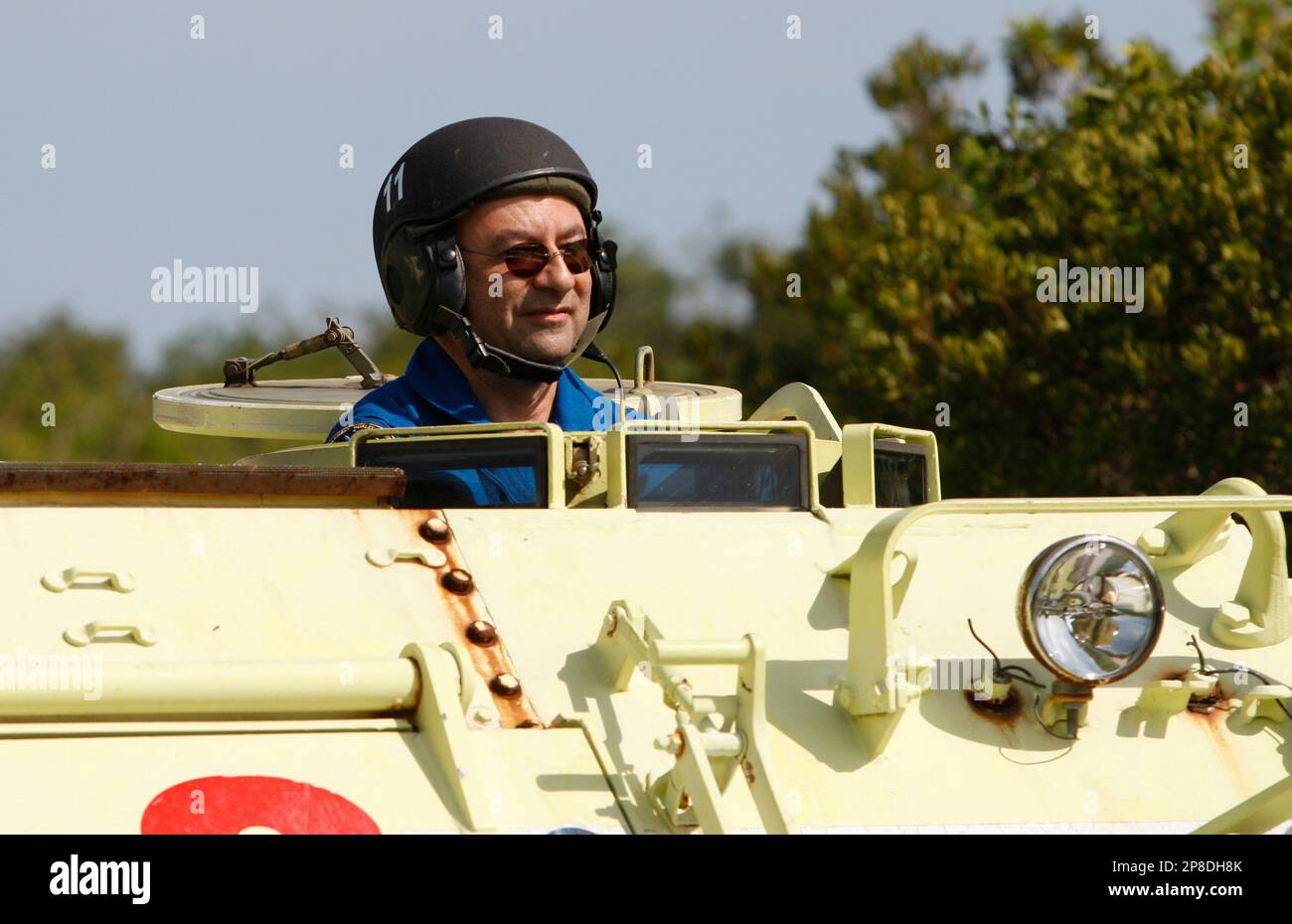 Space shuttle Endeavour commander Mark Polansky performs a training ...