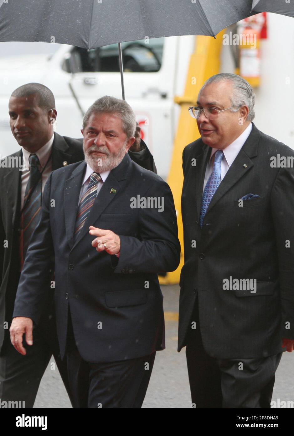 Brazil's President Luiz Inacio Lula da Silva, center, speaks with ...