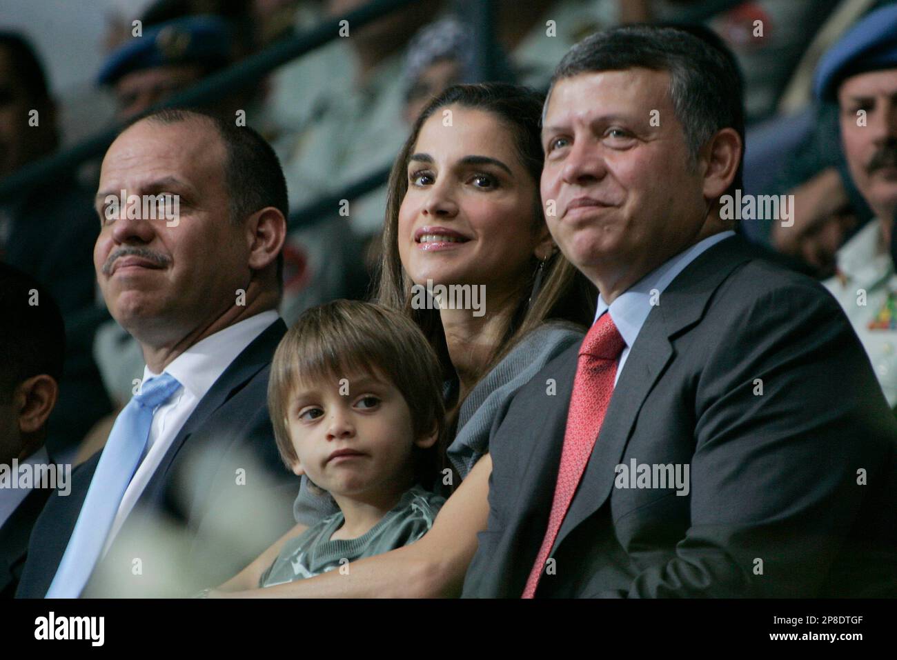 King Abdullah II of Jordan, right, and his wife Queen Rania and his son ...