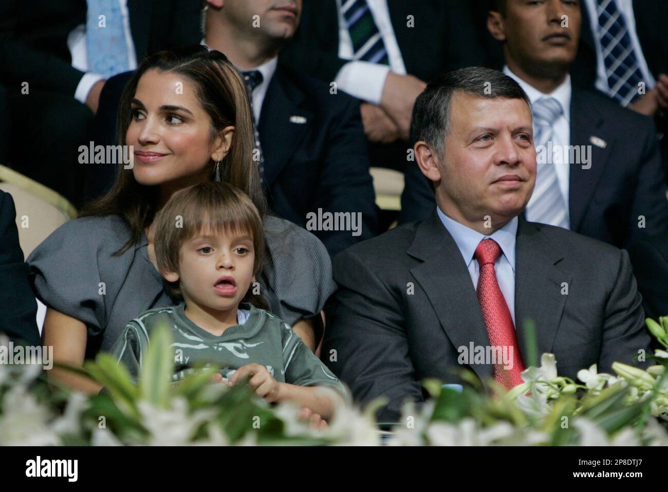 King Abdullah II of Jordan, right, and his wife Queen Rania and his son ...