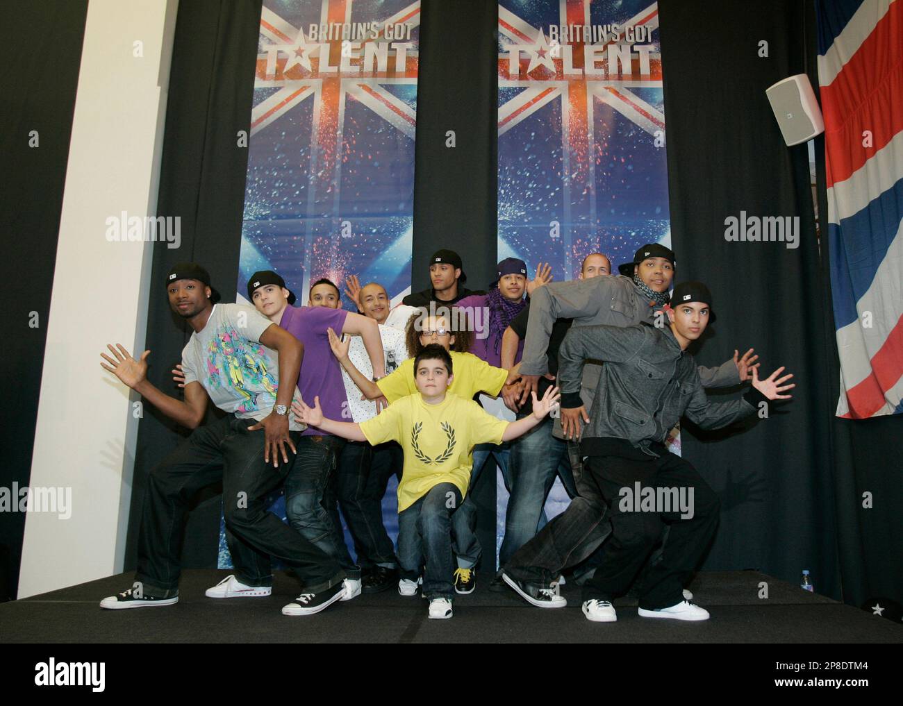 Members of the 11 strong dance group Diversity pose for the media at a ...