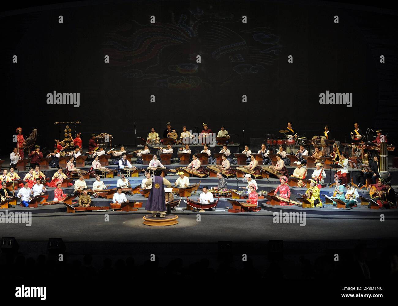 An orchestra, consist of traditional musical instruments from Korea and ...