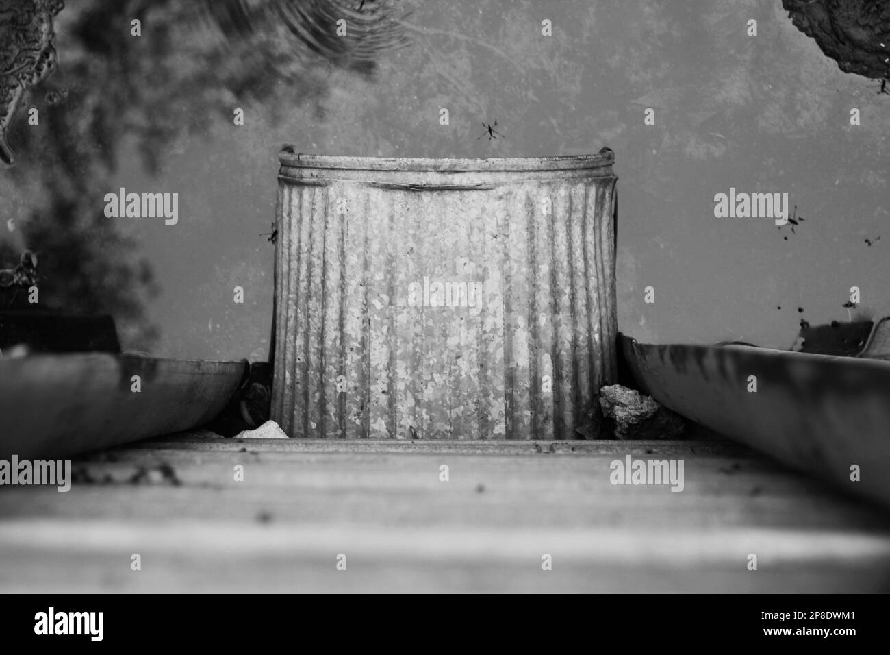 A corrugated steel drainage channel used to divert excess water under ...