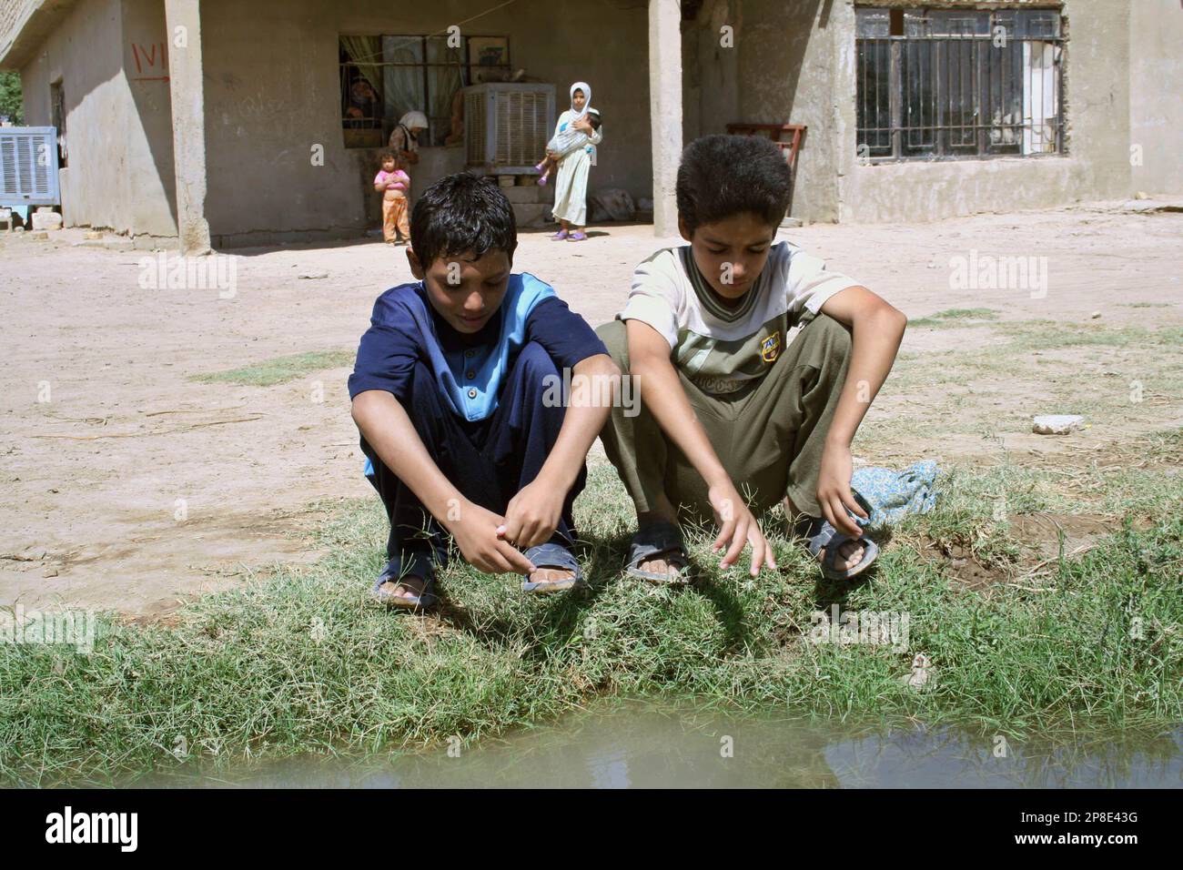 FILE - In this Thursday, July 6, 2006 file photo, Ahmed, left, and ...