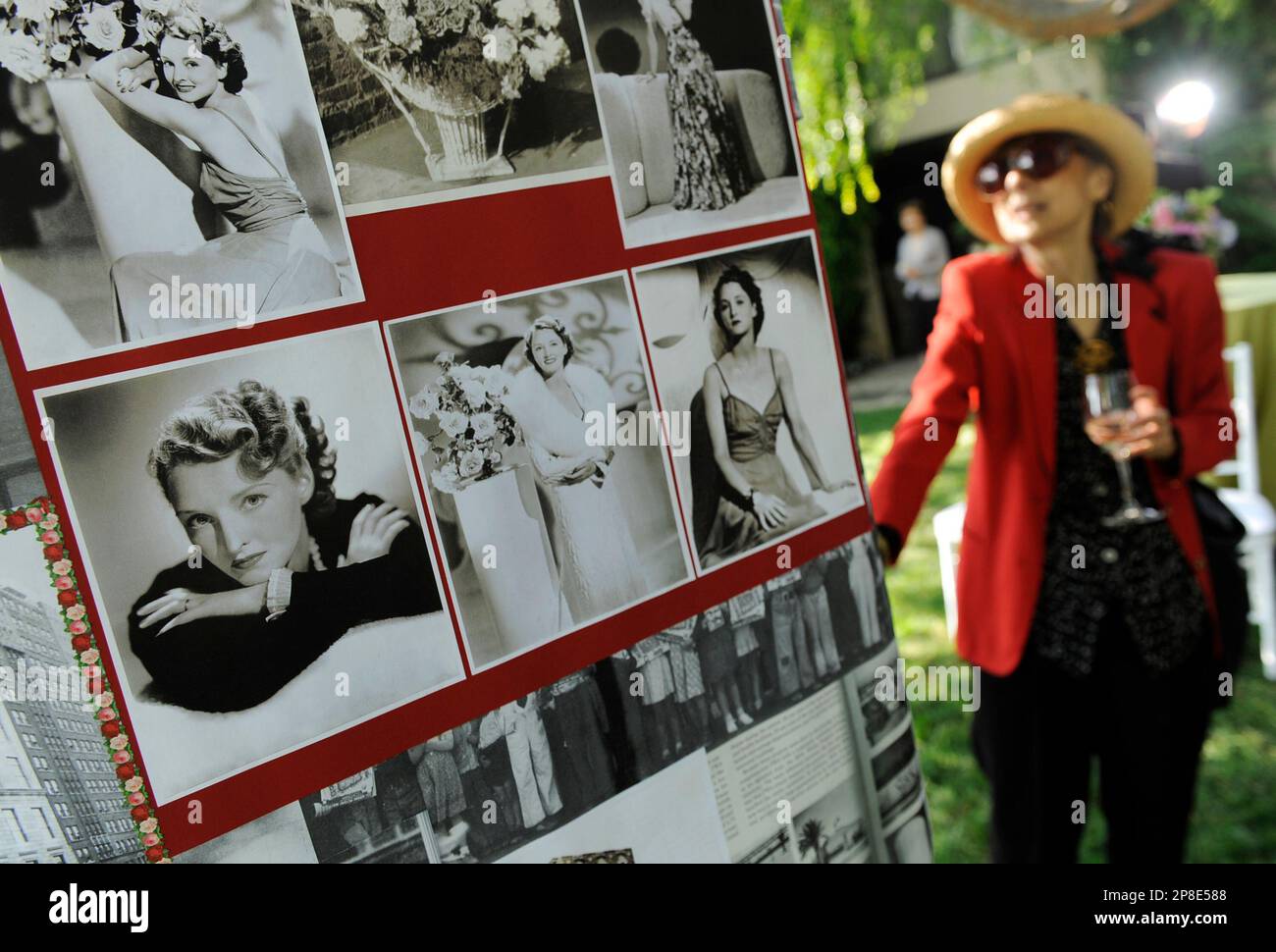 A partygoer views 1930s photos of Dolores Hope on a kiosk at Hope's ...
