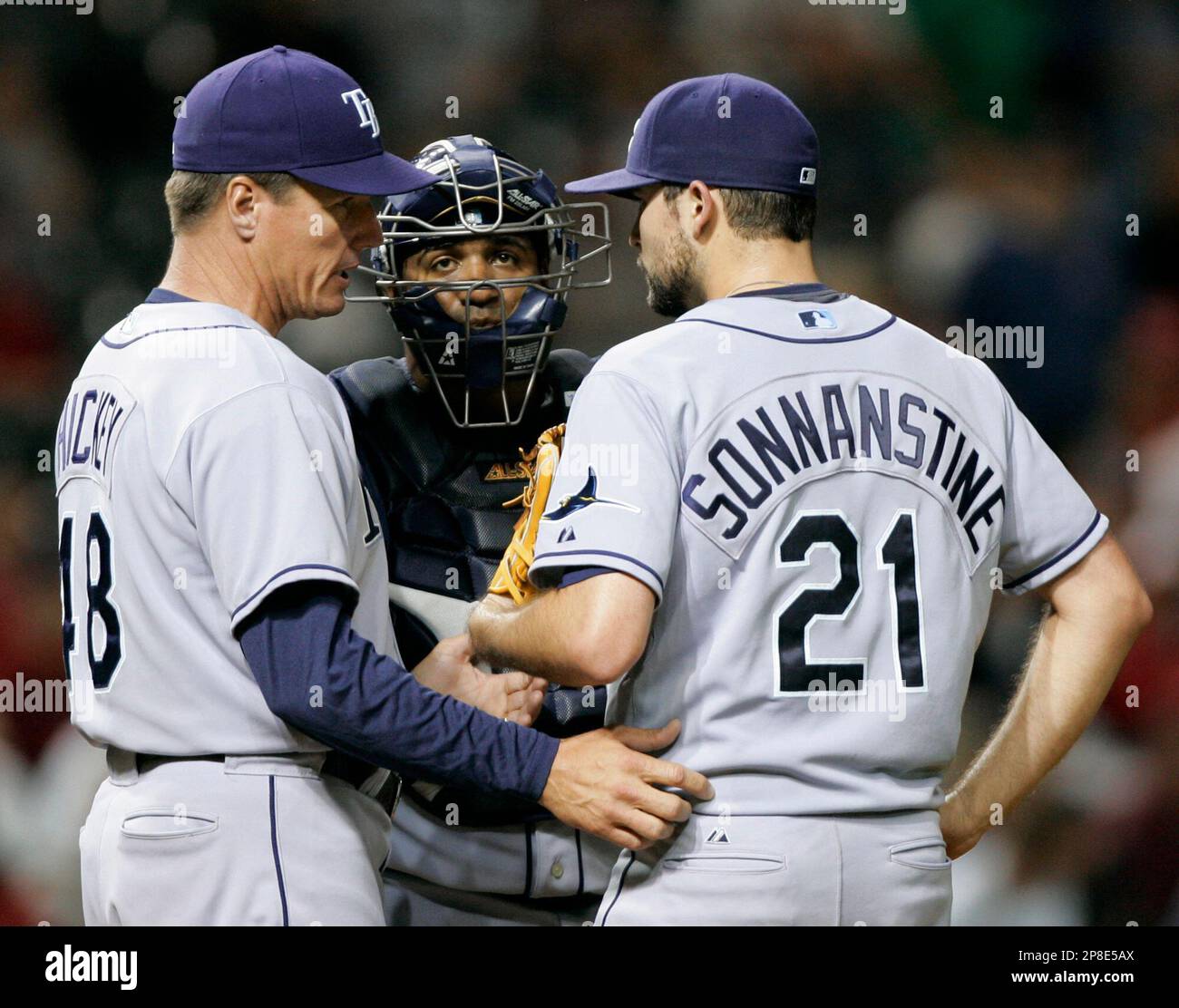 Tampa Bay Rays pitching coach Jim Hickey, left, mets with pitcher Andy ...
