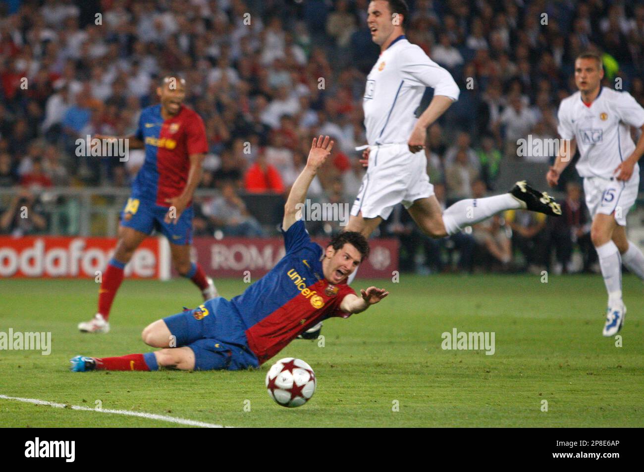 Barcelona's Lionel Messi falls down during the UEFA Champions League ...