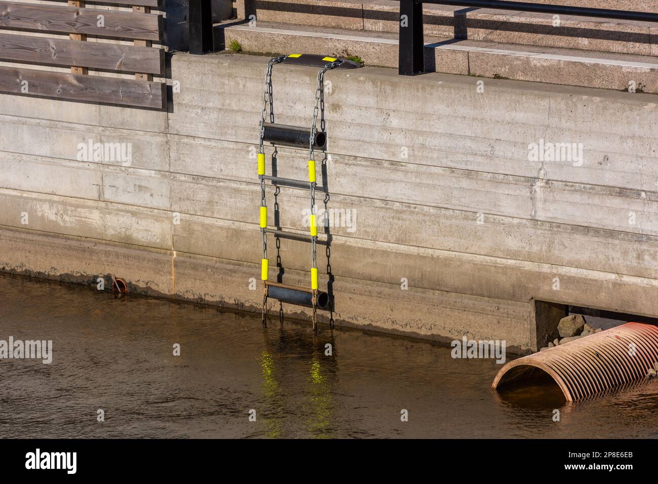 Rescue ladder by a river Stock Photo - Alamy