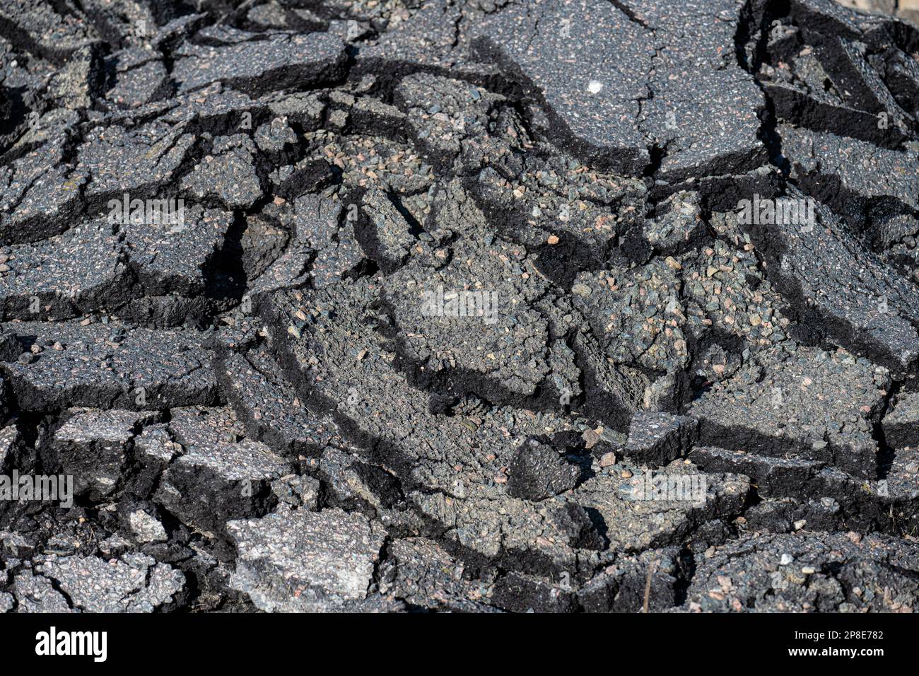 Pile of broken up asphalt chunks Stock Photo - Alamy