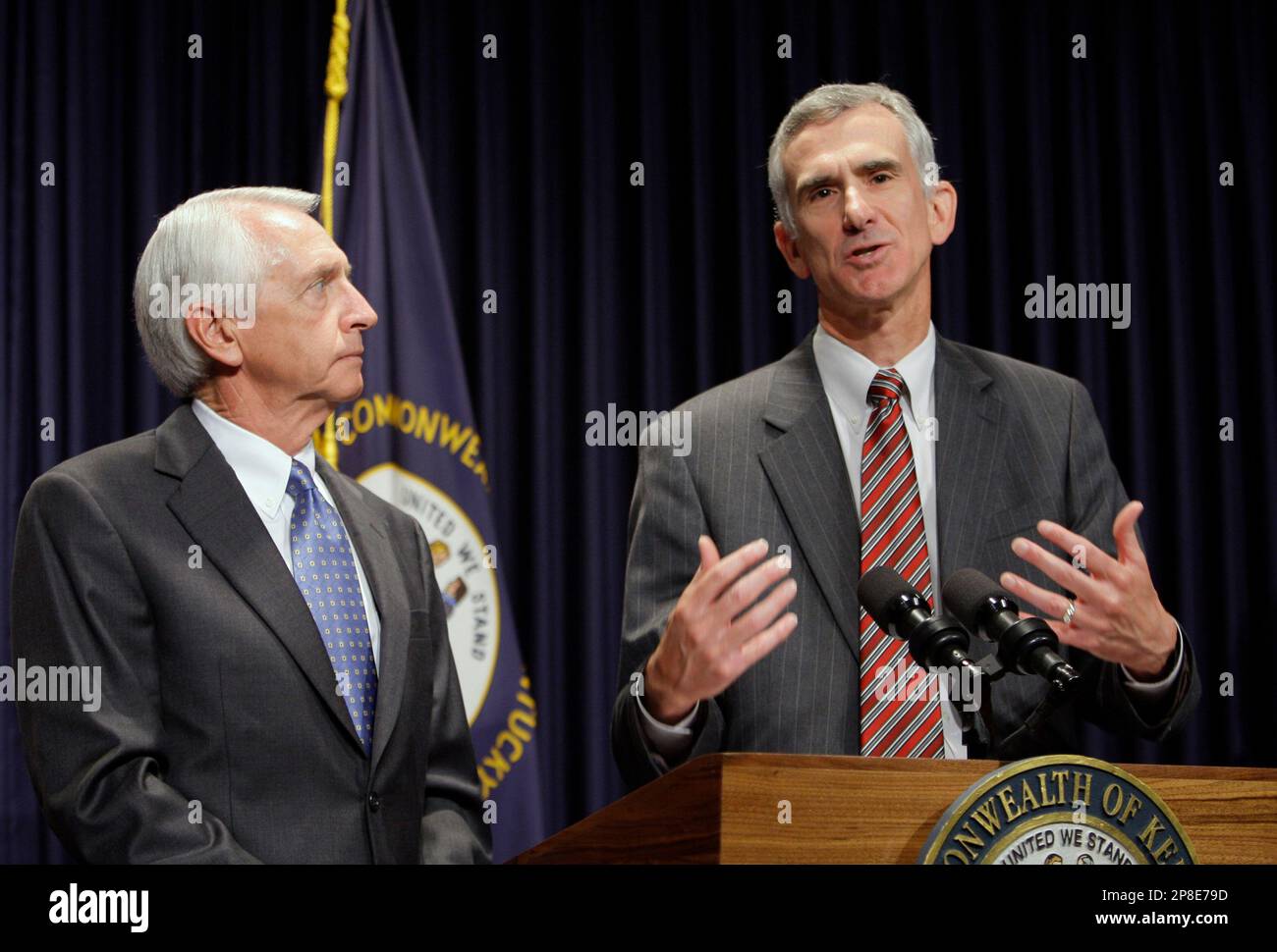 Gov. Steve Beshear looks on at left as Kentucky Housing Corporation ...