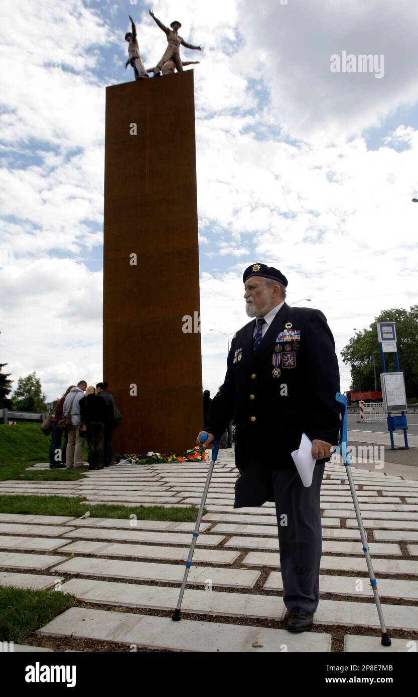 Czech Army's veteran Miroslav Frost, 64, stands by a monument that was ...
