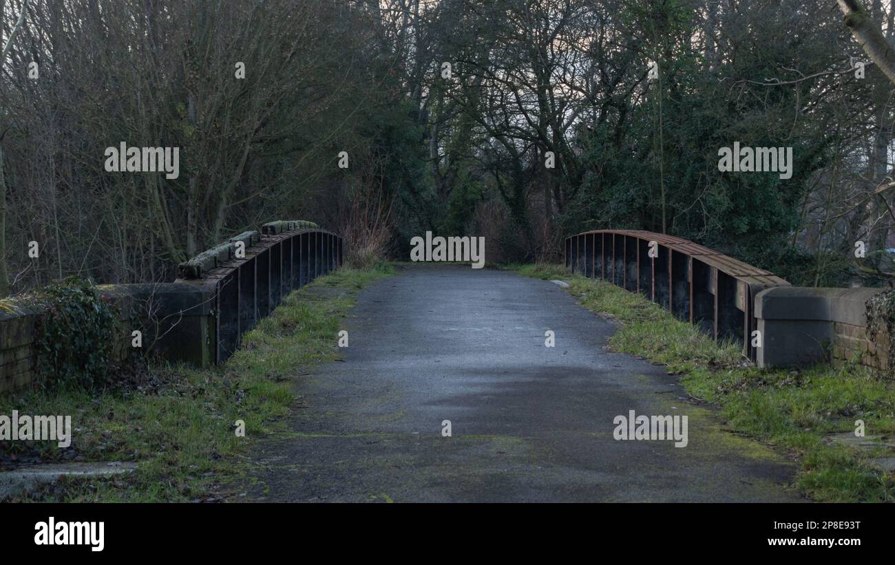 Damaged road over a bridge to ans island in a lake Stock Photo - Alamy
