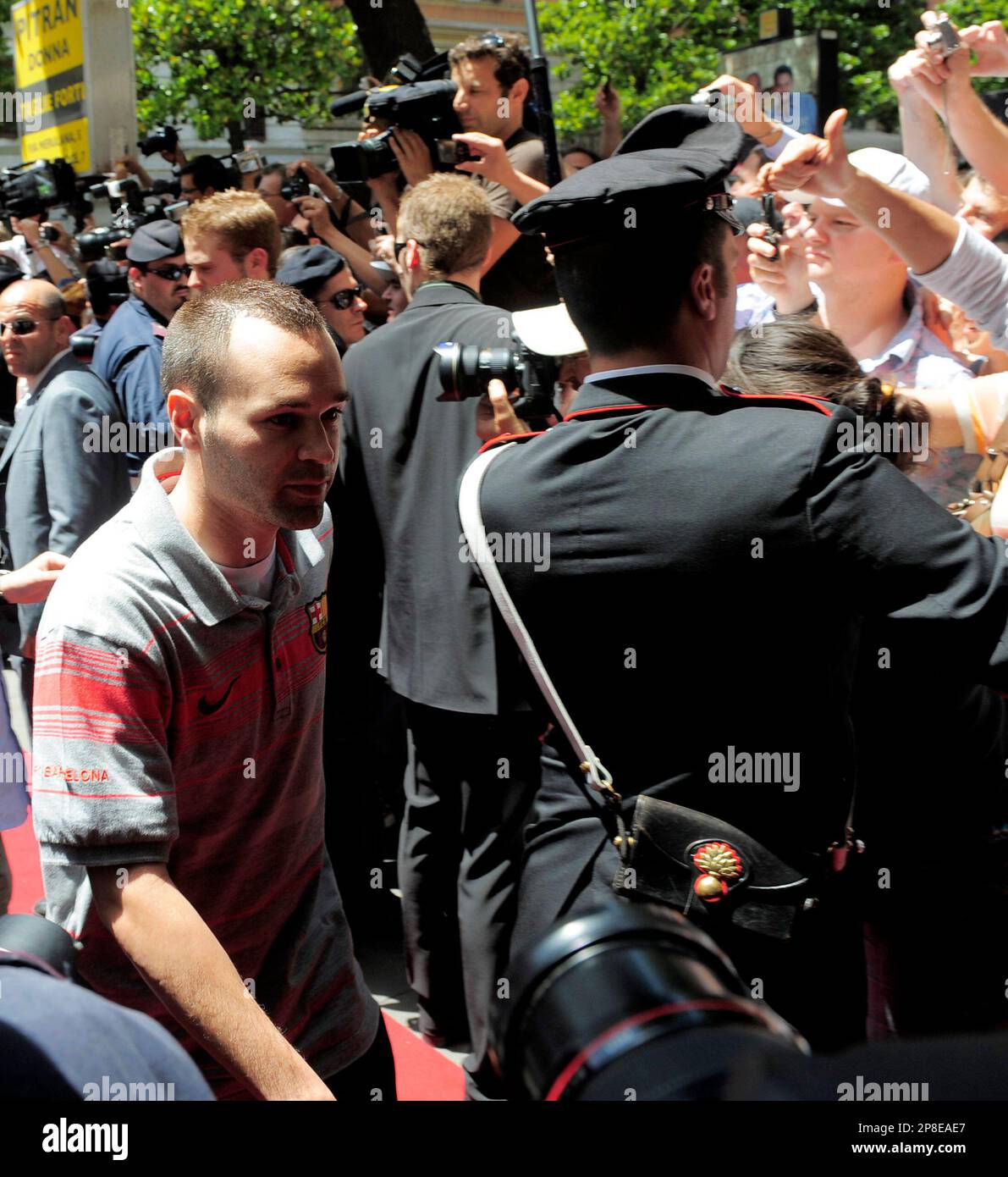 Barcelona midfielder Andres Iniesta arrives at his hotel in Rome ...