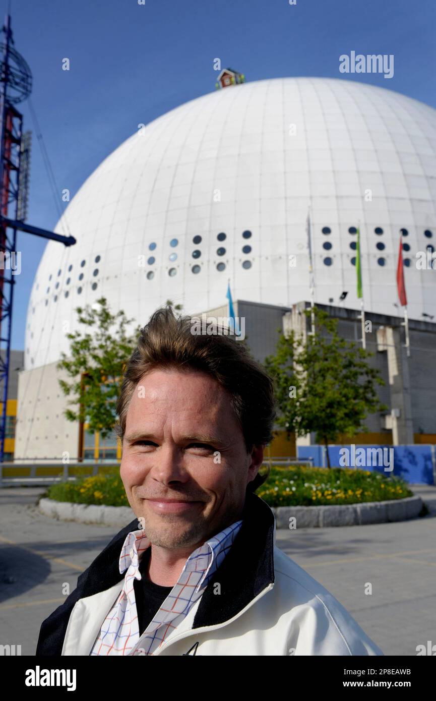 Swedish artist Mikael Genberg stands in front of the 85 meter high ...