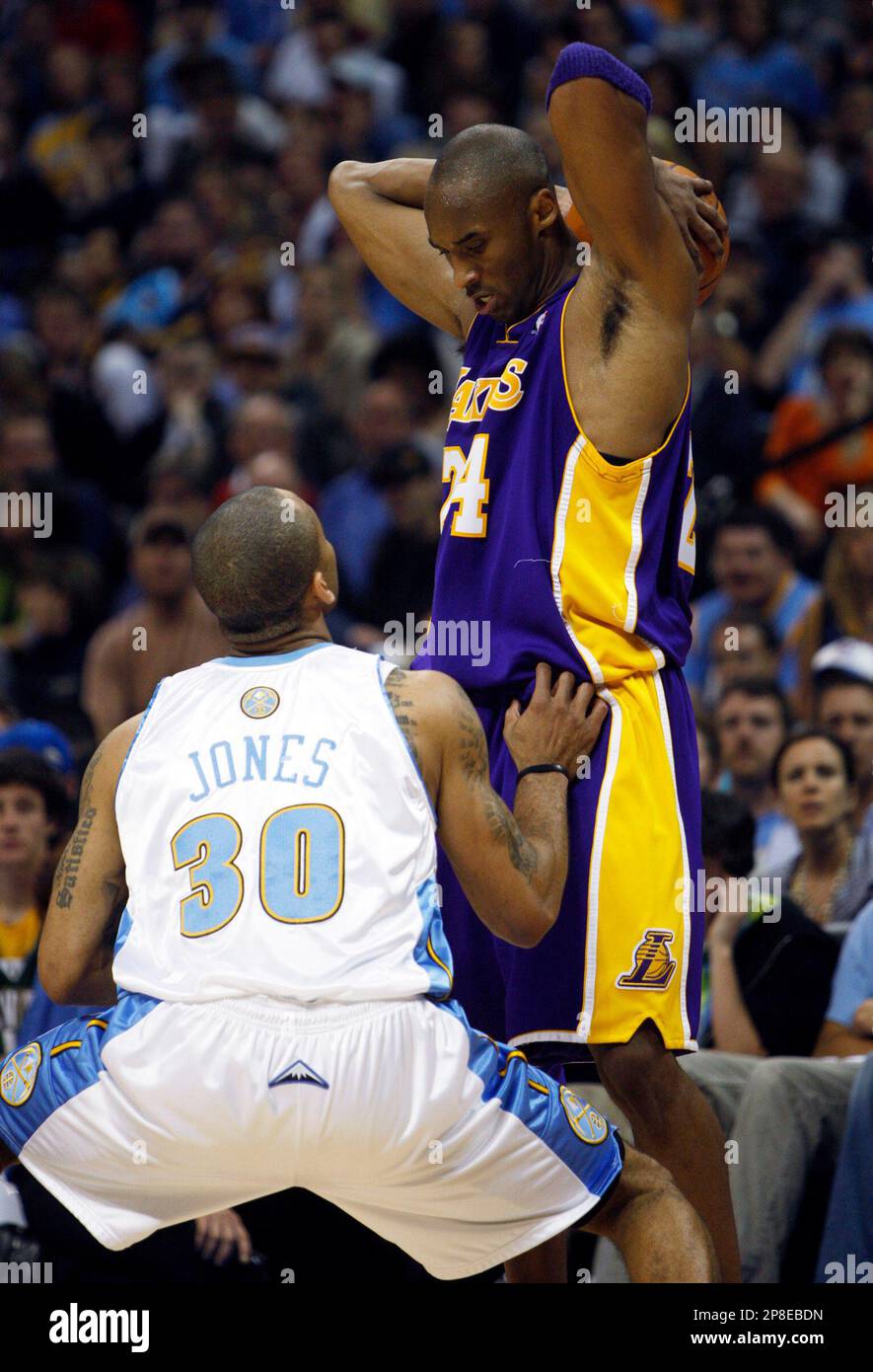 Denver Nuggets guard Dahntay Jones (30) defends against Los Angeles ...
