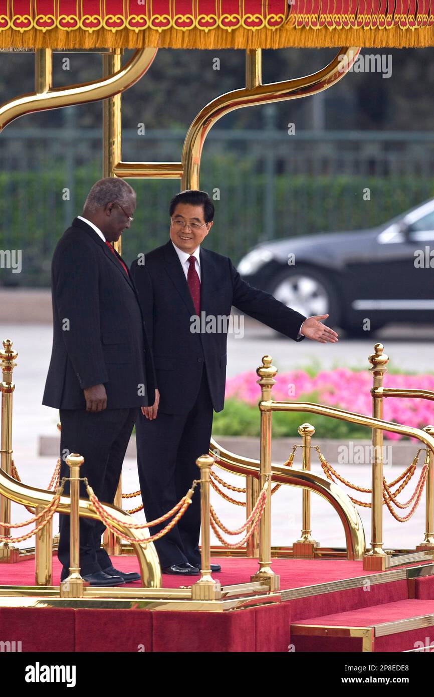 Chinese President Hu Jintao, right, gestures to invite Sierra Leone ...