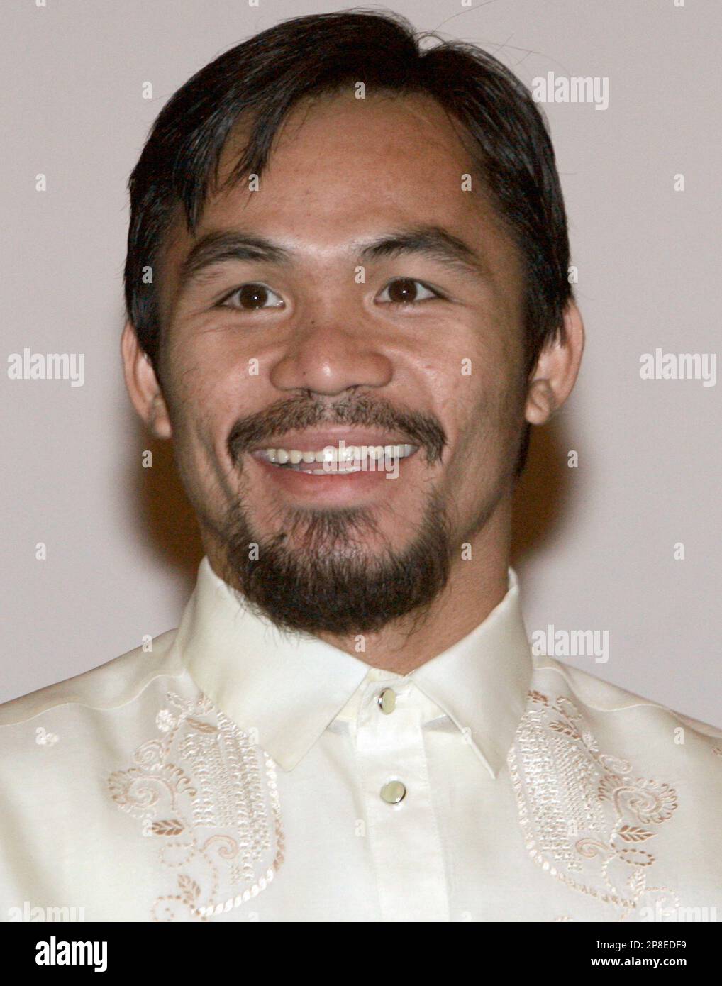 Philippine boxing star Manny Pacquiao smiles as he meets Thailand's ...