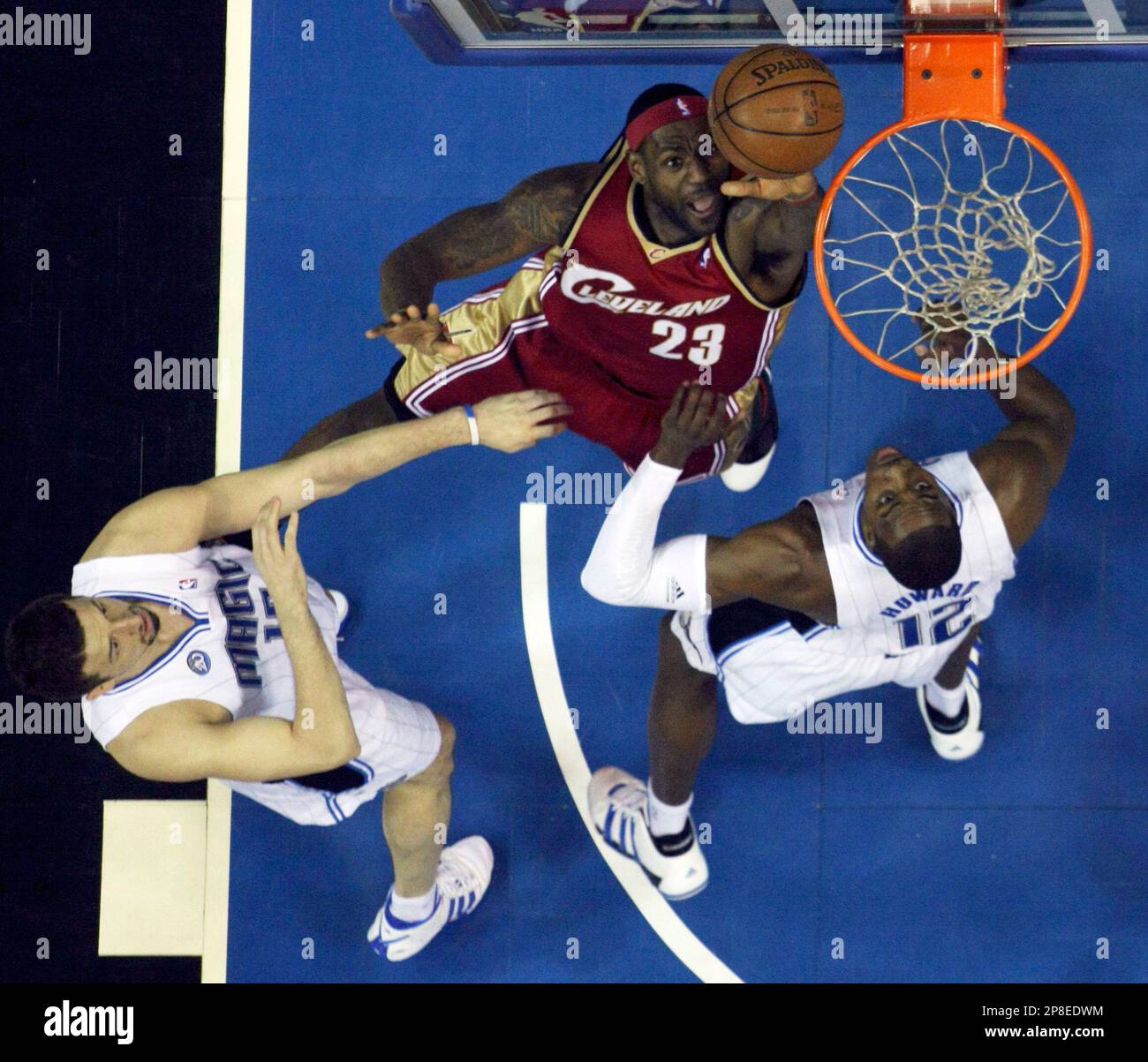 Cleveland Cavaliers forward LeBron James (23) makes a shot over Orlando ...