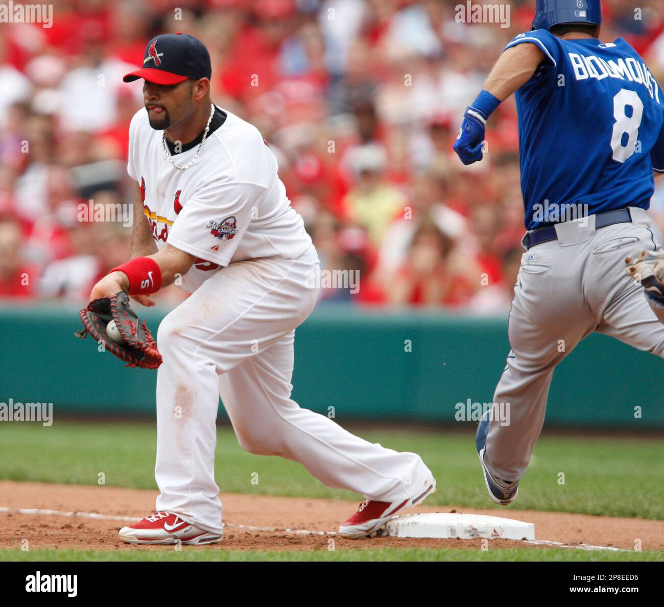 St. Louis Cardinals first baseman Albert Pujols catches the ball just ...