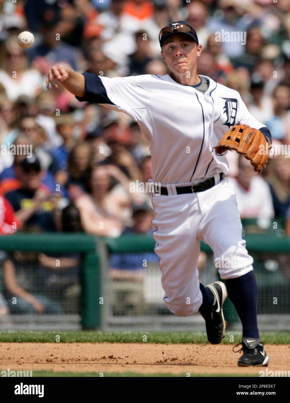 Detroit Tigers third baseman Brandon Inge throws out Colorado Rockies ...