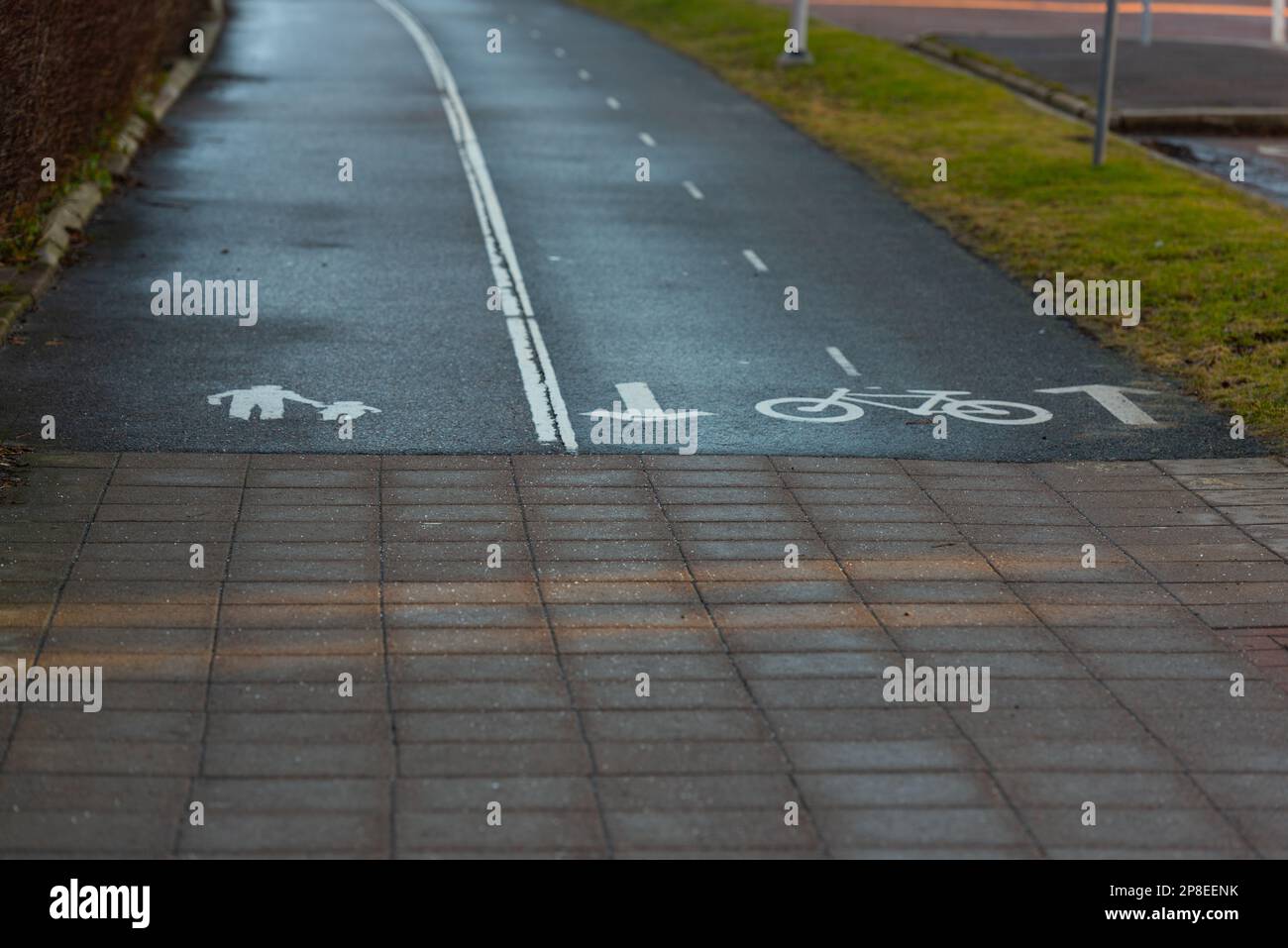 Road marked as reserved for walking and two lane bicycling Stock Photo ...