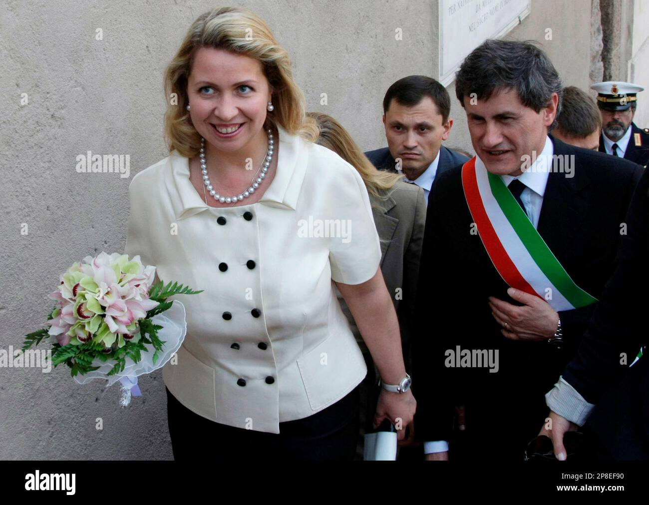 Russian President Dmitry Medvedev's wife, Svetlana, left, walks with ...