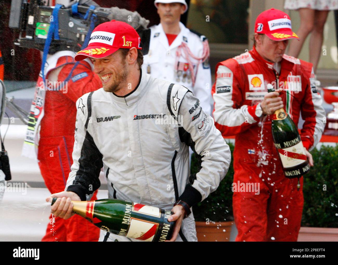 Brawn GP driver Jenson Button of Britain celebrates after winning the ...