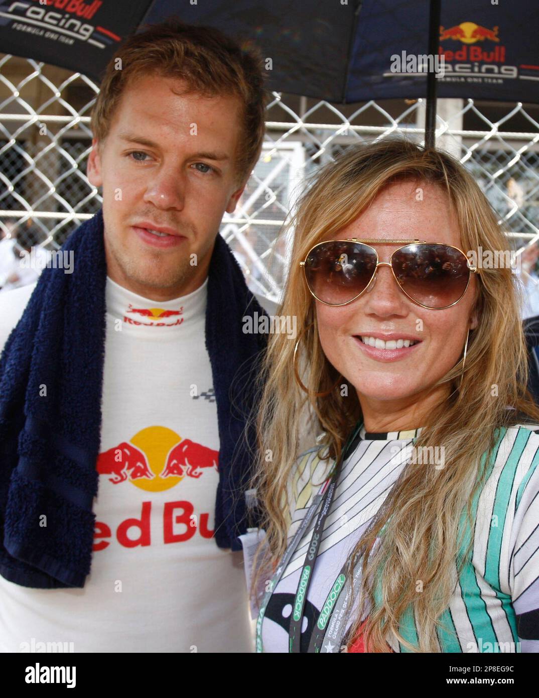 British pop star Geri Halliwell poses with Red Bull driver Sebastian ...