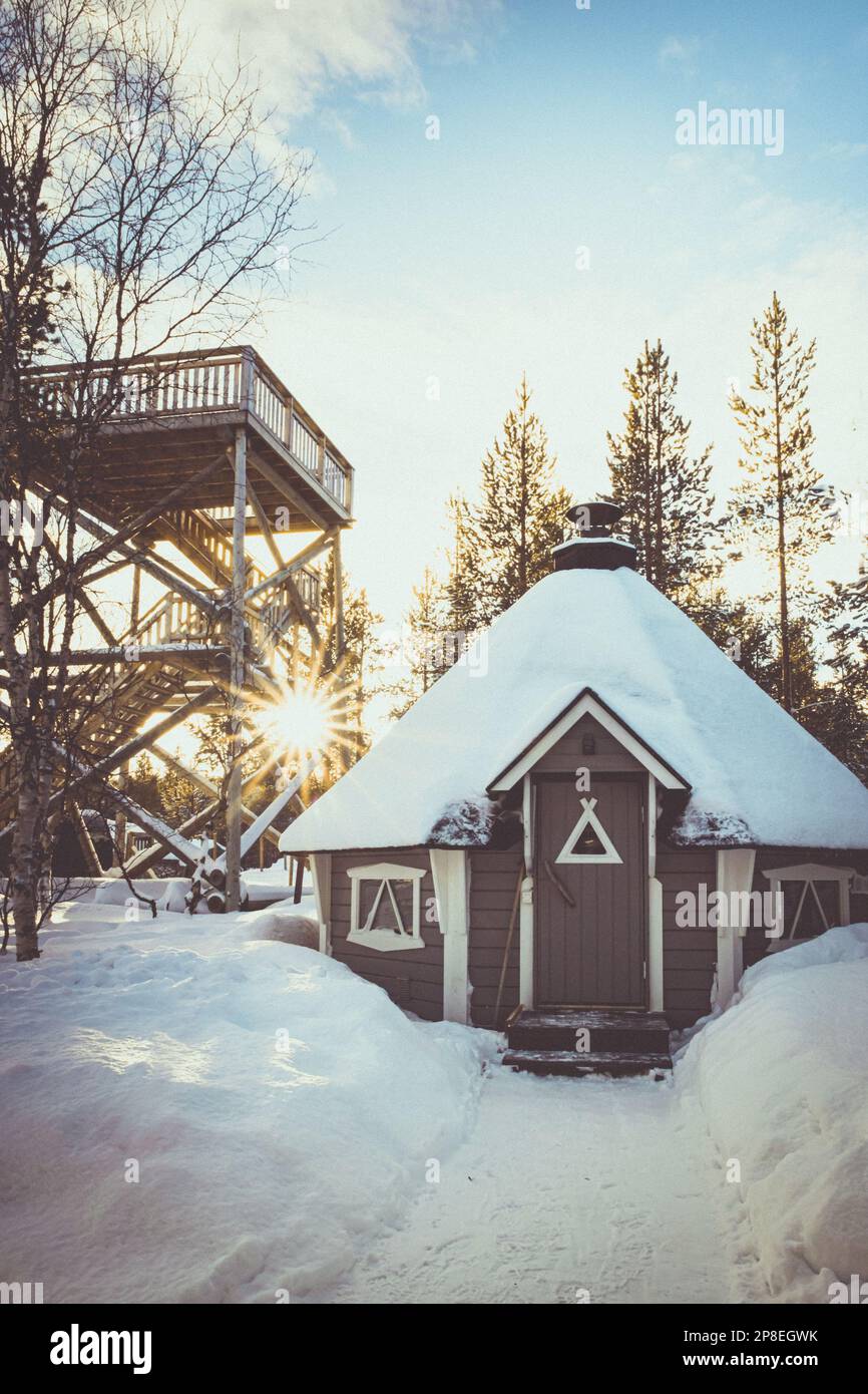 Snow covered Kota hut and watchtower in Utsjoki, Finland Stock Photo ...