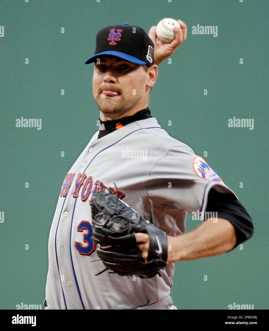 New York Mets starting pitcher Mike Pelfrey delivers against the Boston ...