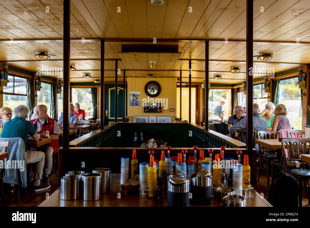 Interior of running buffet pancake ship with syrup in the foreground ...